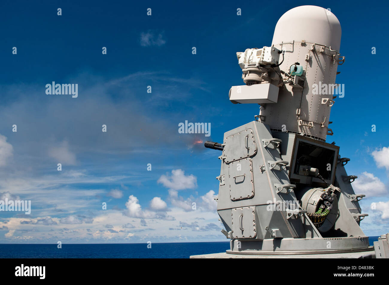 The Close-In Weapon System (CIWS) aboard a naval vessel fires at sea ...
