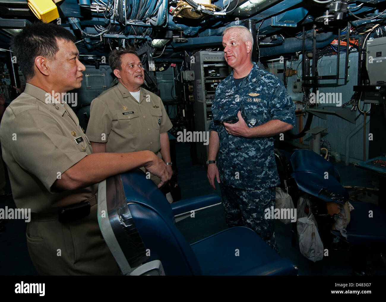 A U.S. Navy captain visits a Philippine ship in Subic Bay ...