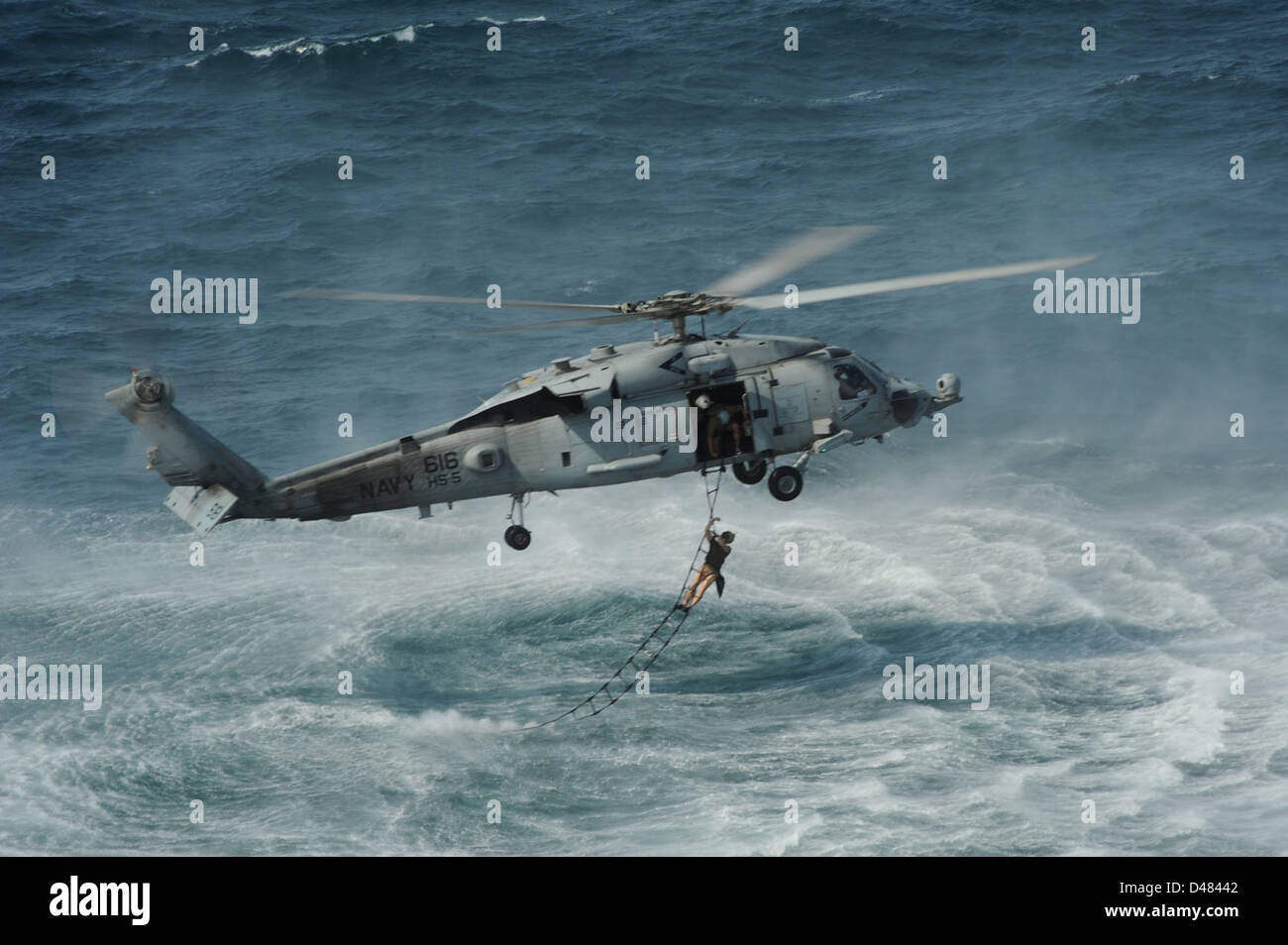 A Sea Hawk helicopter performs a ladder recovery operation in the U.S ...