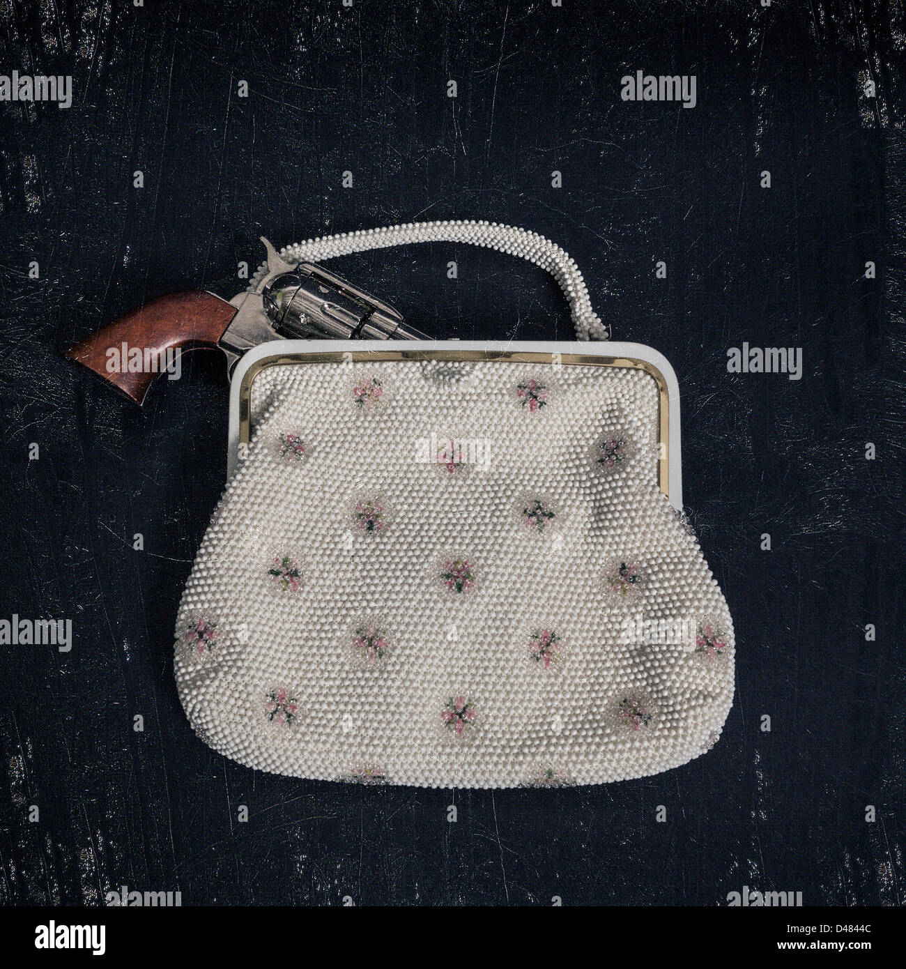 Handbag with gun hi-res stock photography and images - Alamy