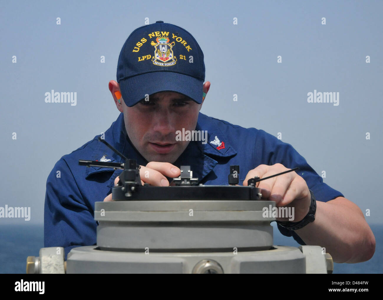 Sailor uses azimuth circle Stock Photo - Alamy
