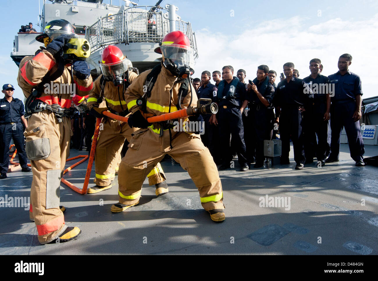 Sailors demonstrate firefighting Stock Photo - Alamy