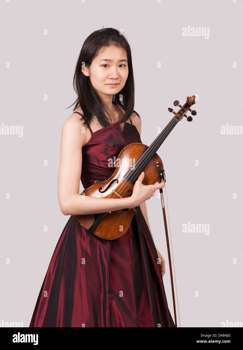 young female violin player Stock Photo - Alamy