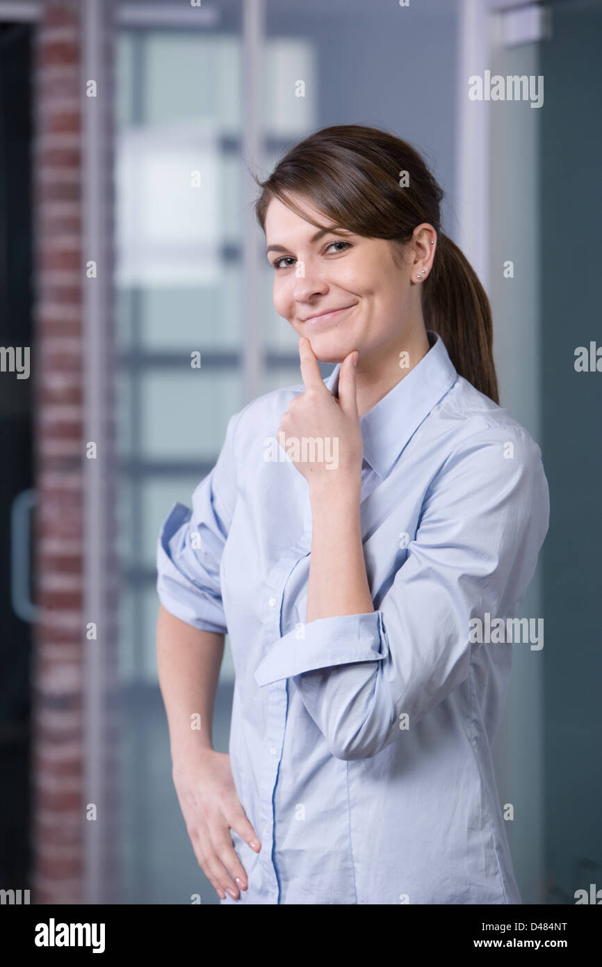 Business woman thinking Stock Photo - Alamy