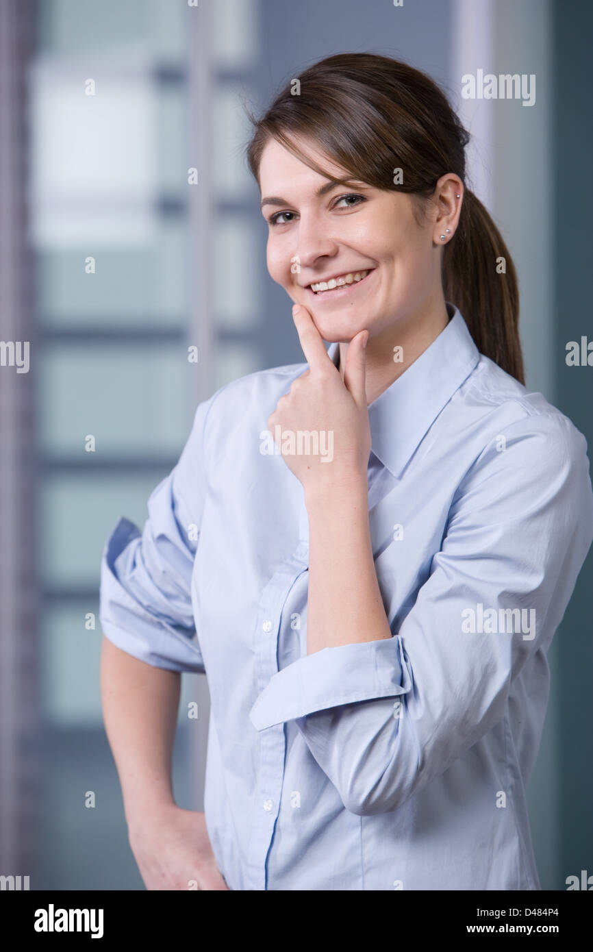 Business woman thinking Stock Photo - Alamy