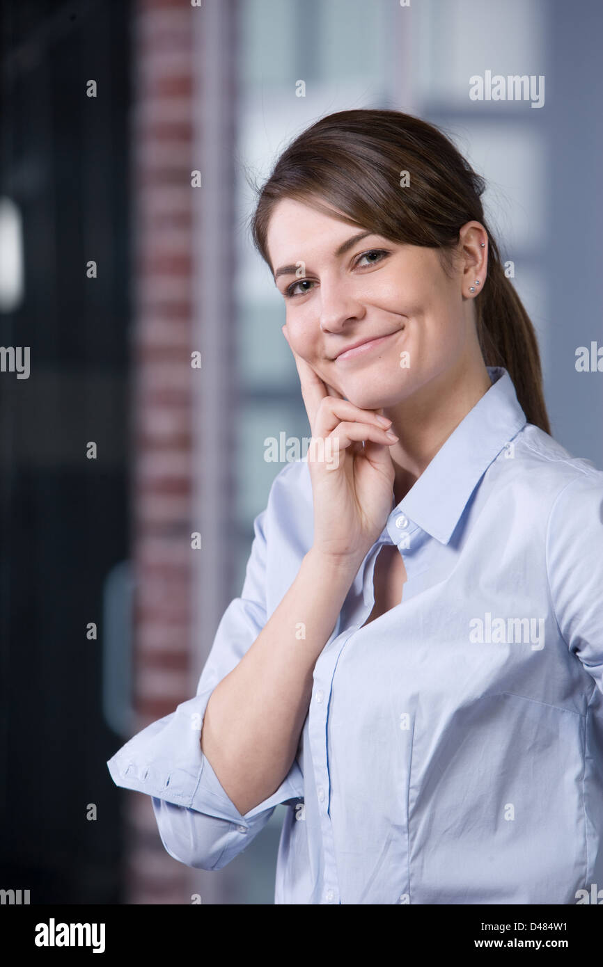 Business woman thinking Stock Photo - Alamy