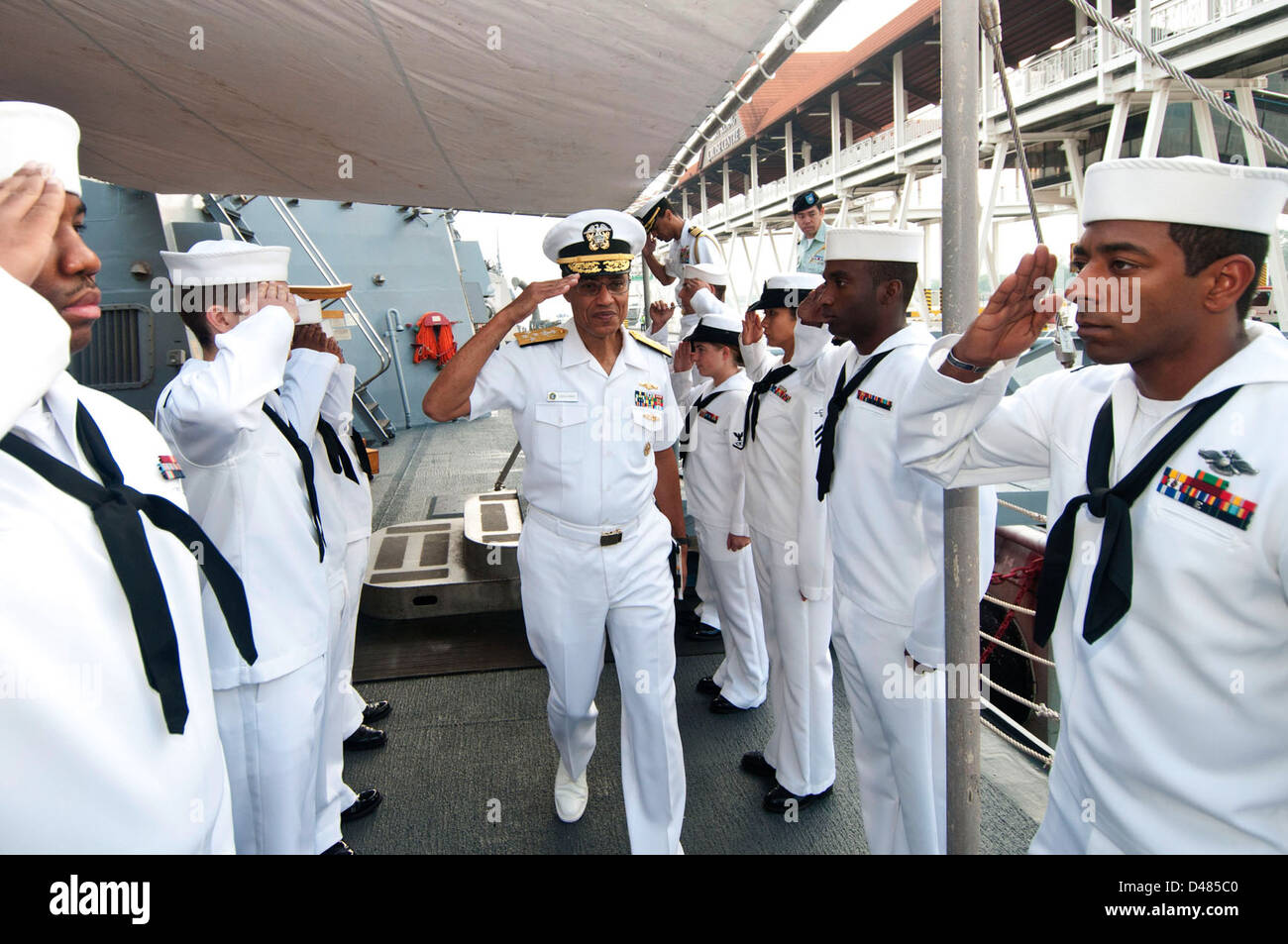 Adm. Cecil Haney arrives aboard USS Mustin during the 2012 Western Pacific Naval Symposium in ...