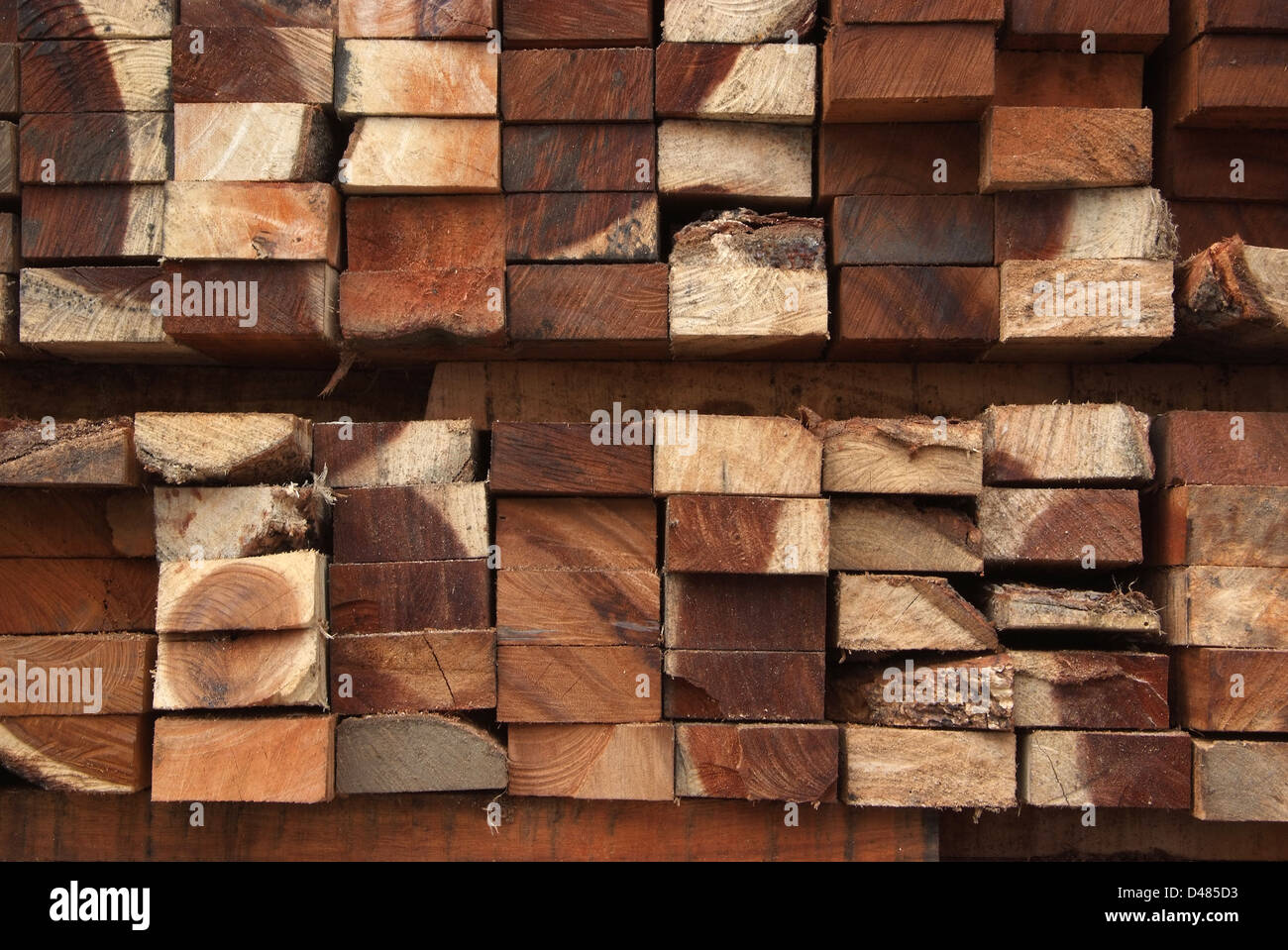 A pile of cut wood for construction ( texture, background, pattern ...