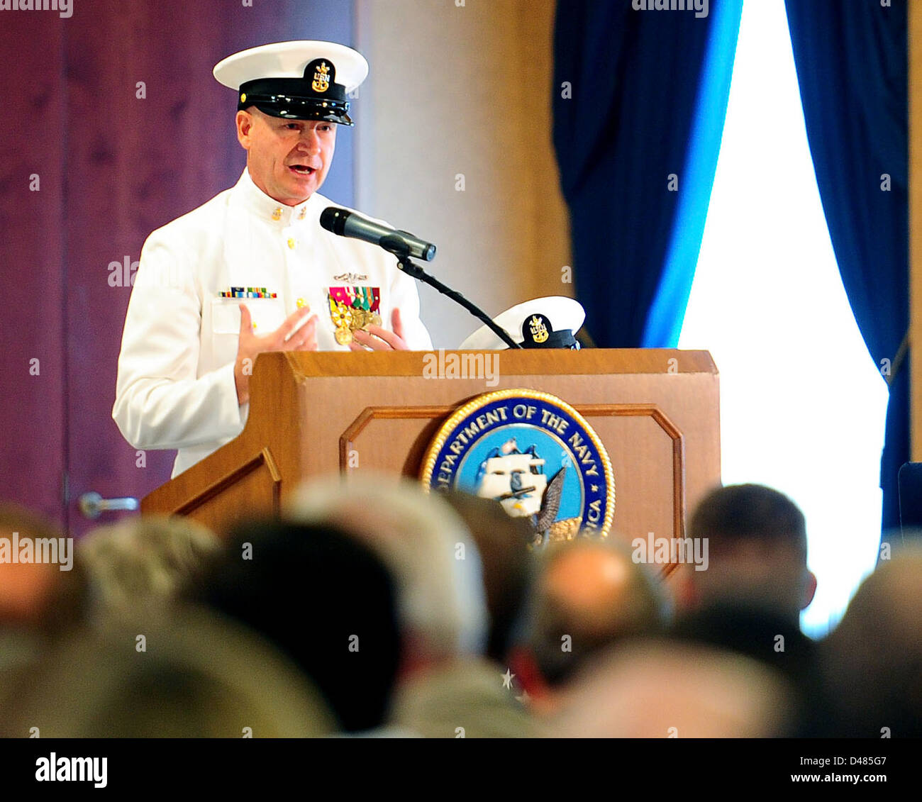 Retired MCPON Rick West speaks at his Change of Office Stock Photo - Alamy