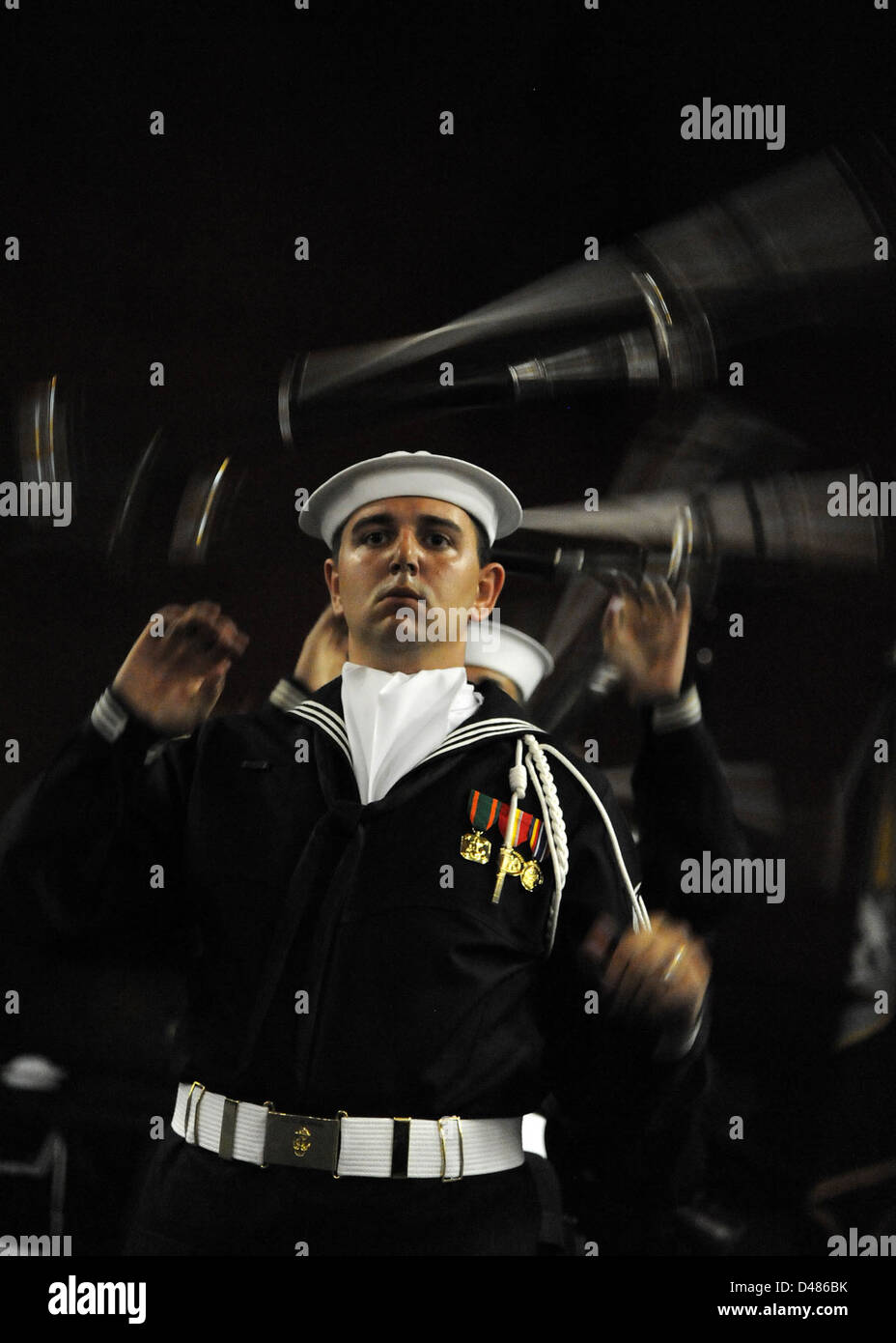 A Sailor from the Ceremonial Guard twirls a rifle Stock Photo - Alamy
