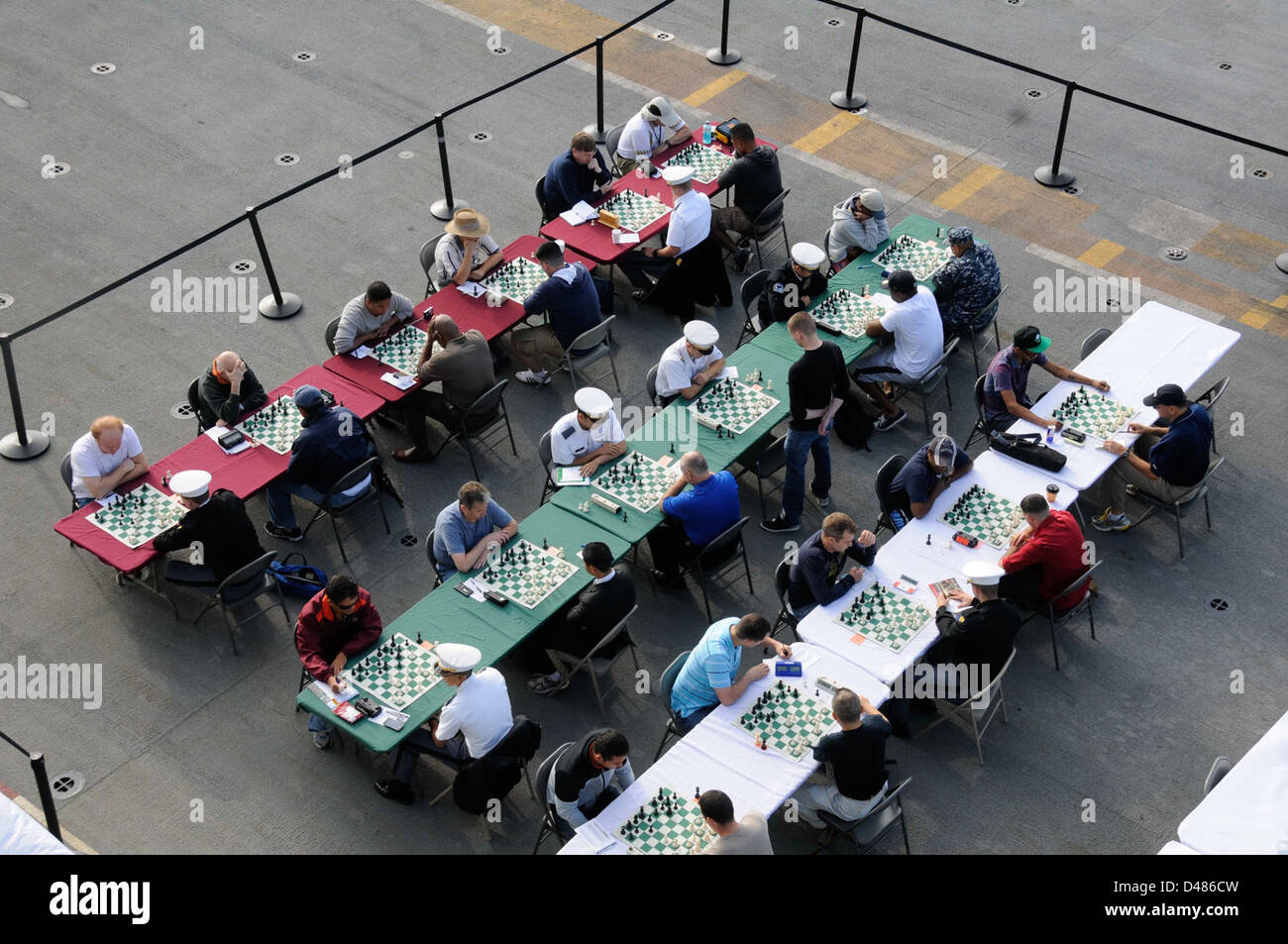 Sailors aboard the USS Wasp play chess during downtime, engaging in ...