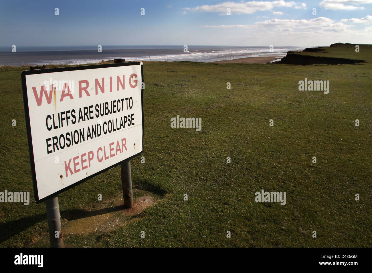 Dangerous cliff warning sign Stock Photo - Alamy