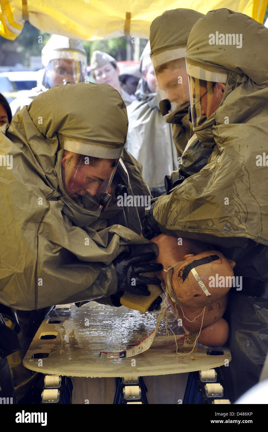 U.S. Navy sailors participate in a decontamination drill in Yokosuka ...
