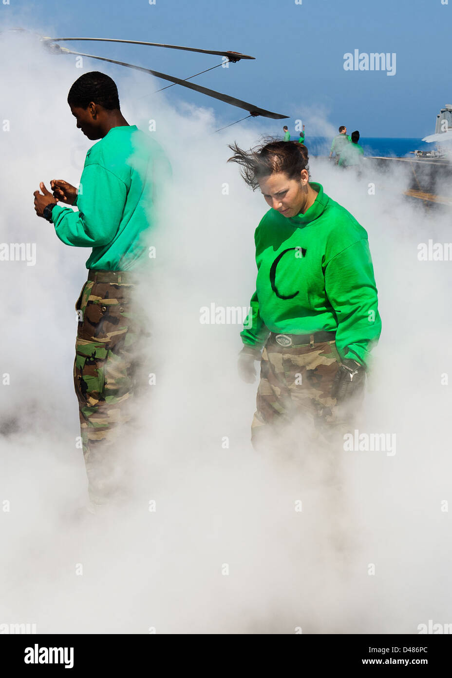 Sailors aboard a U.S. Navy ship test the steam catapult in the Red Sea ...