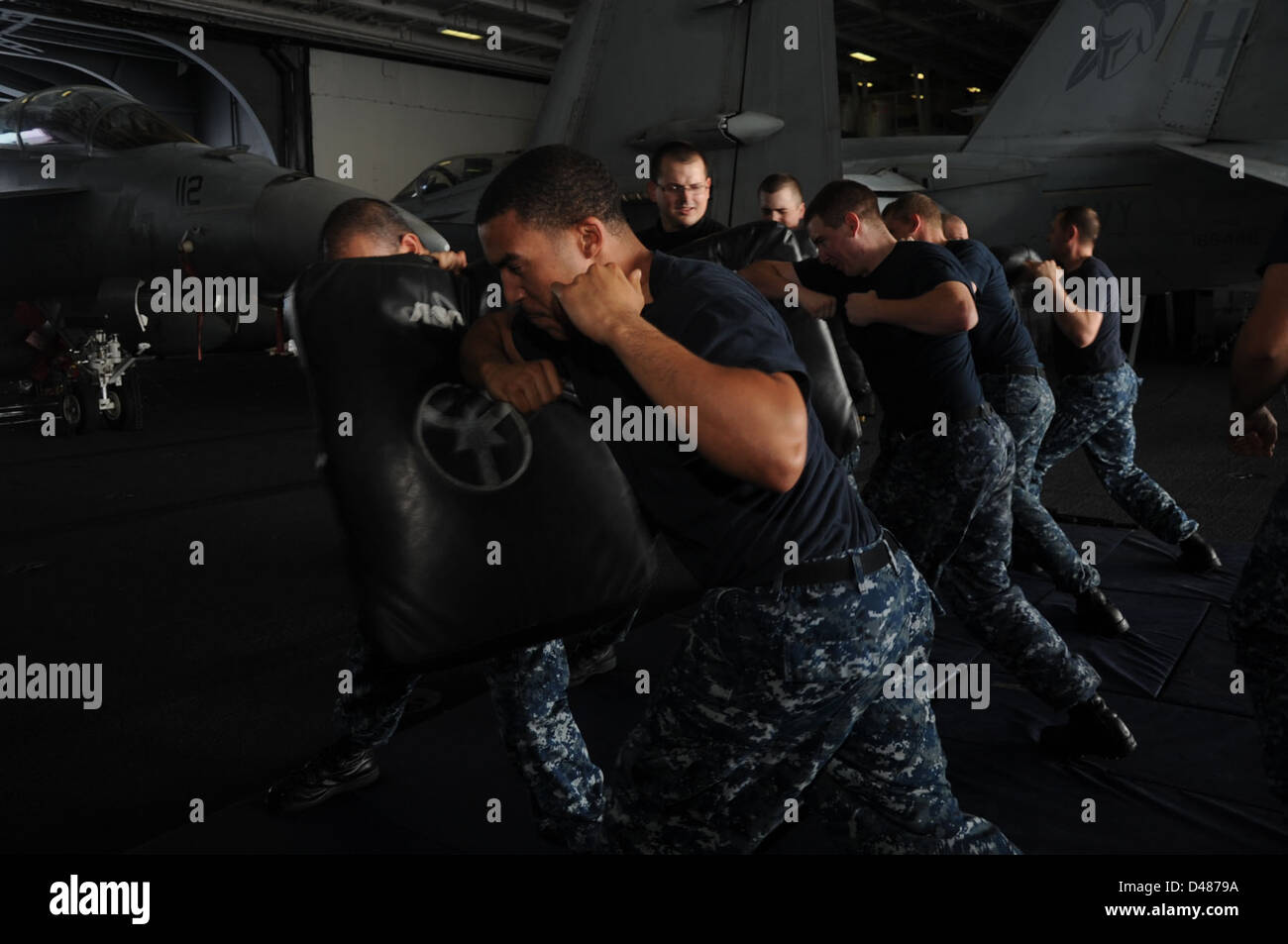 Sailors practice blocking techniques Stock Photo - Alamy