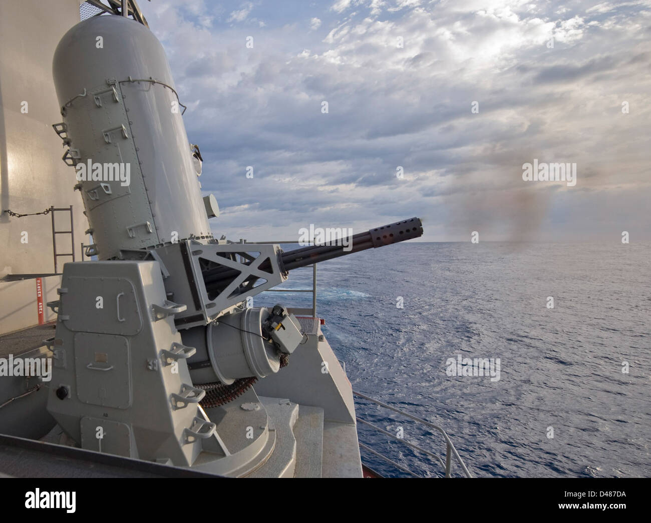 The Close-In Weapon System (CIWS) fires aboard the USS Harry S. Truman ...