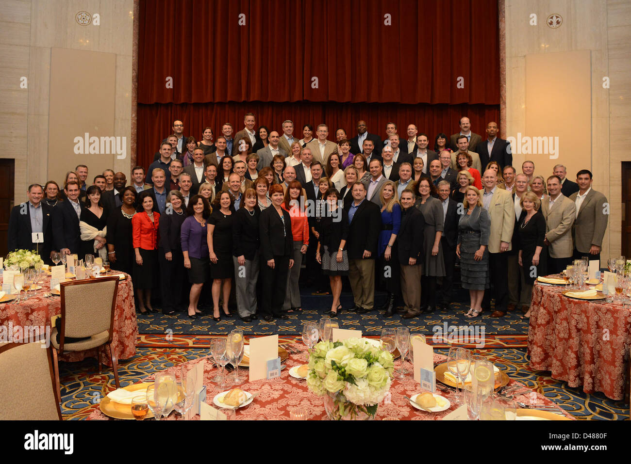 New flag officers, Senior Executive Service members and spouses pose ...