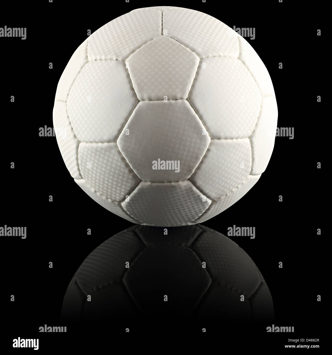 a handball in front of black background Stock Photo - Alamy