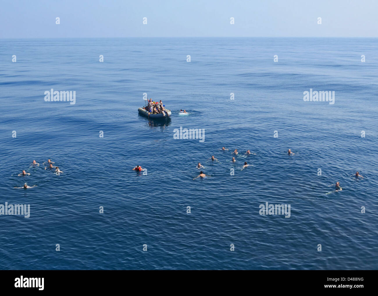 Sailors and Marines enjoy a swim call in the U.S. 5th Fleet Area of ...
