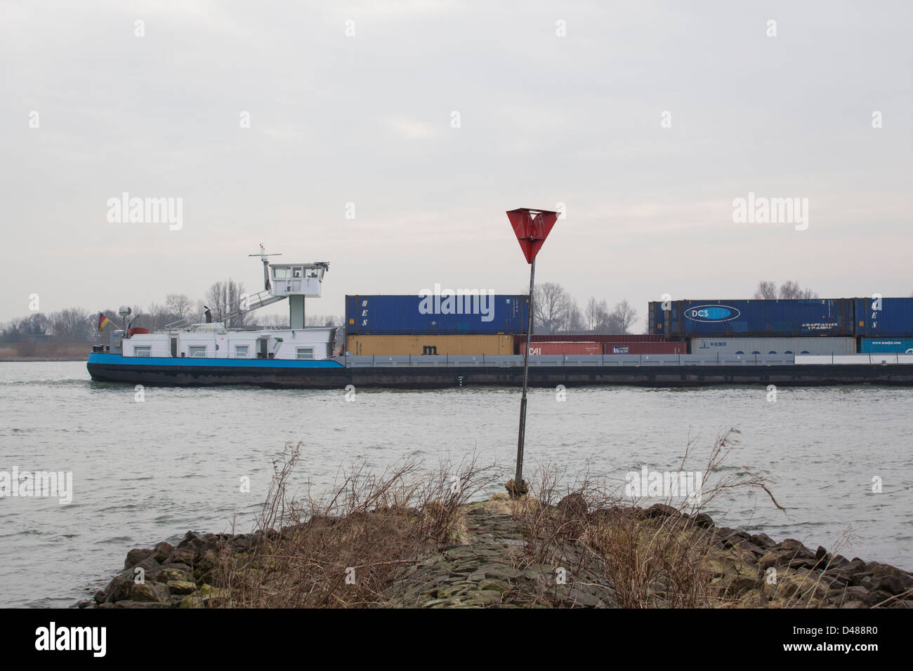 German container ship with Chinese freight on the river Rhine in the ...