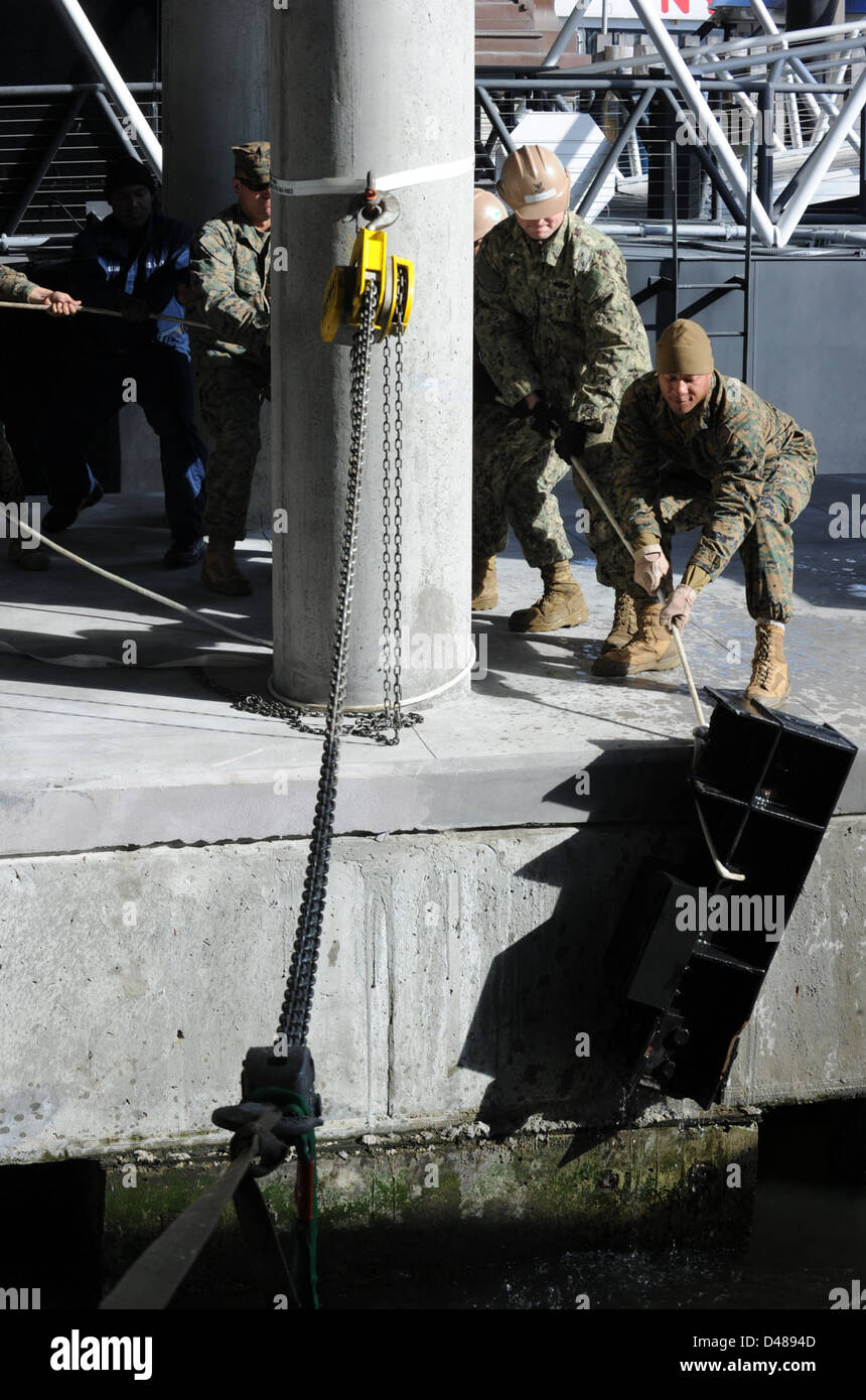 Sailors from the U.S. Navy assist at the Hoboken Transit Terminal in ...