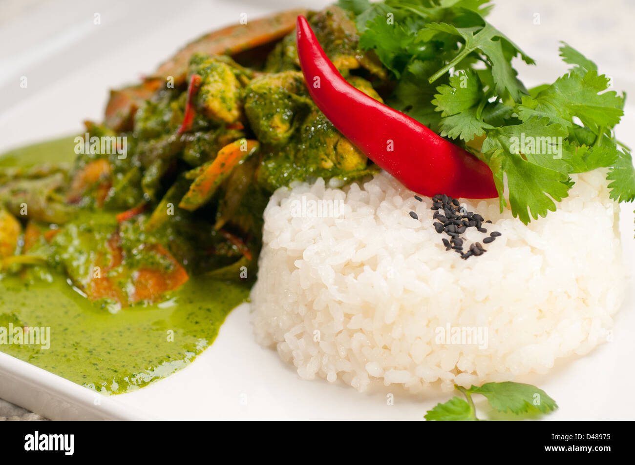 chicken with green curry fresh vegetables and rice Stock Photo - Alamy