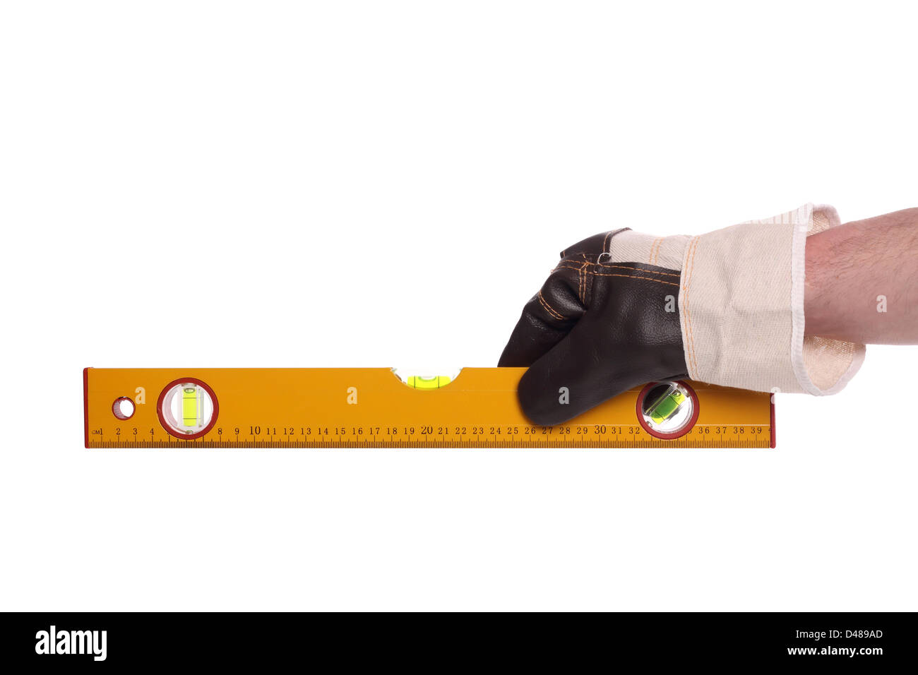 water level with a hand in working glove Stock Photo - Alamy