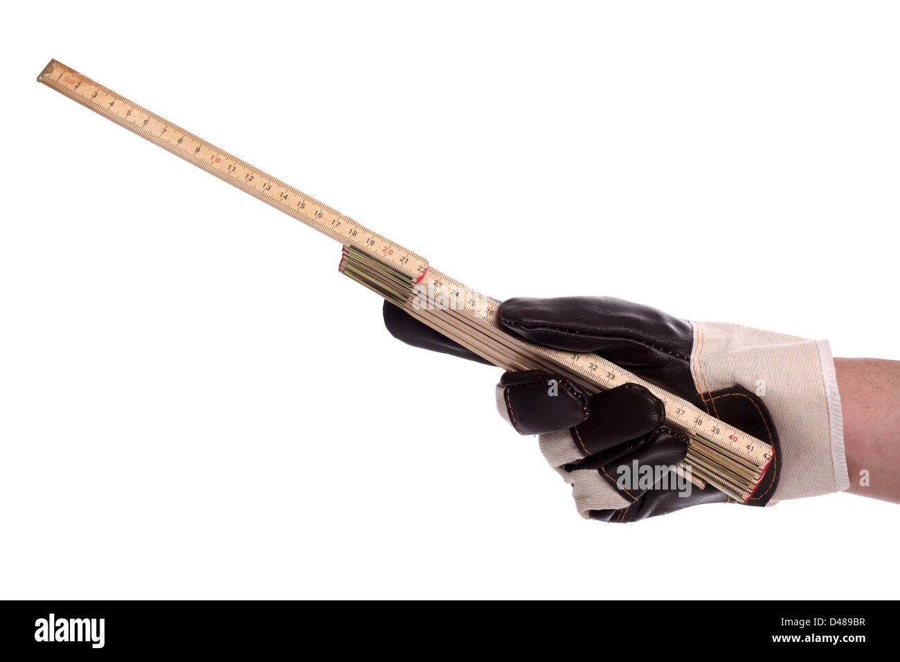 A hand with a yard stick Stock Photo - Alamy