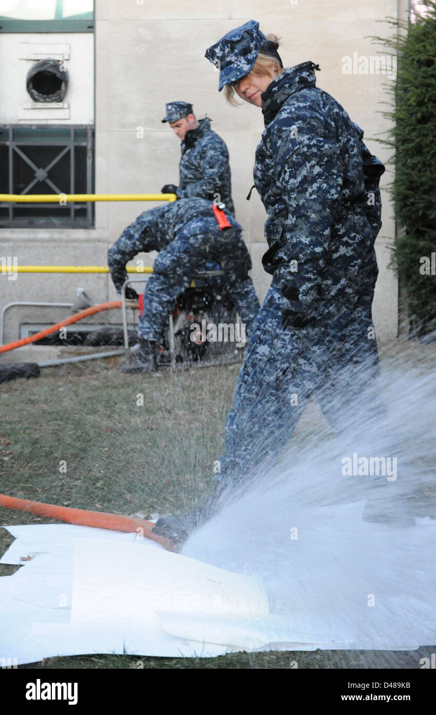 Sailors assist with Hurricane Sandy clean-up Stock Photo - Alamy