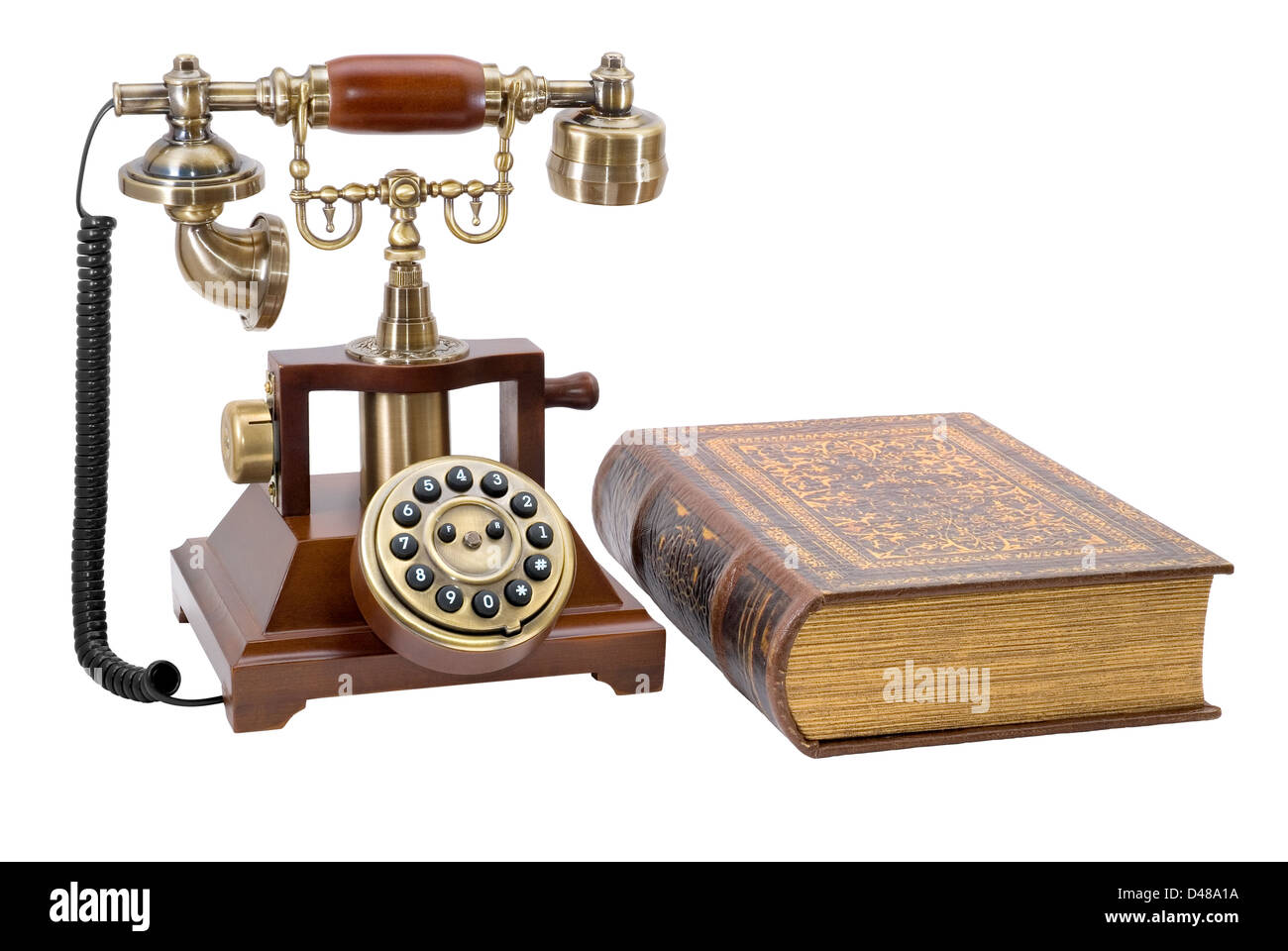 Ancient phone and book are photographed on the white background Stock ...
