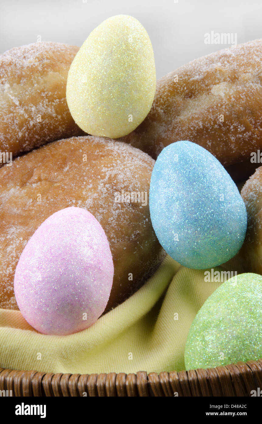 Easter basket with eggs and jelly filled donut Stock Photo - Alamy