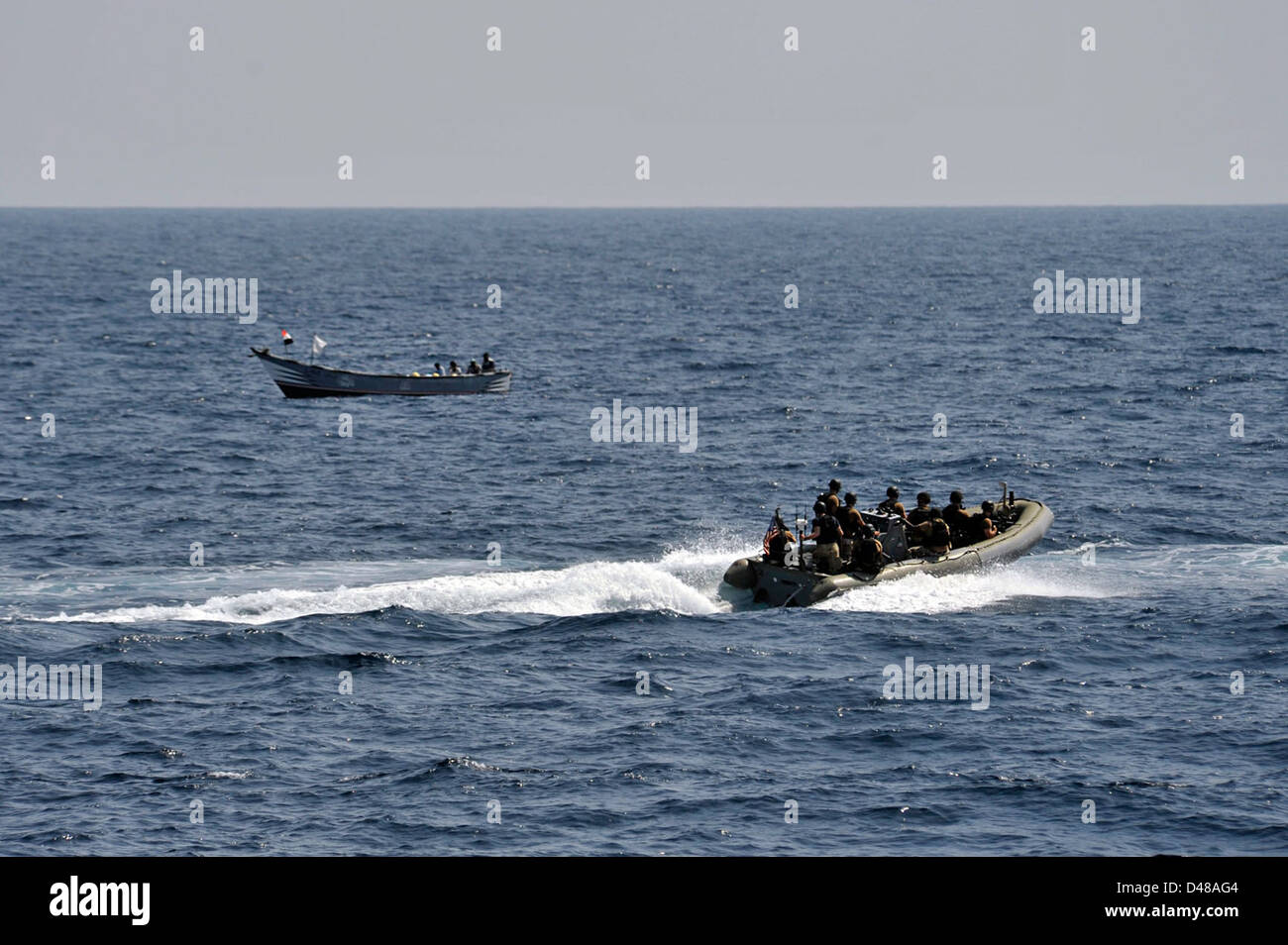 A VBSS team approaches a fishing vessel Stock Photo - Alamy