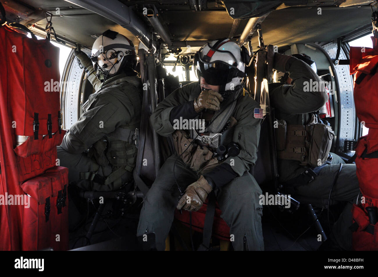 Sailors inside an MH-60S Sea Hawk Stock Photo - Alamy