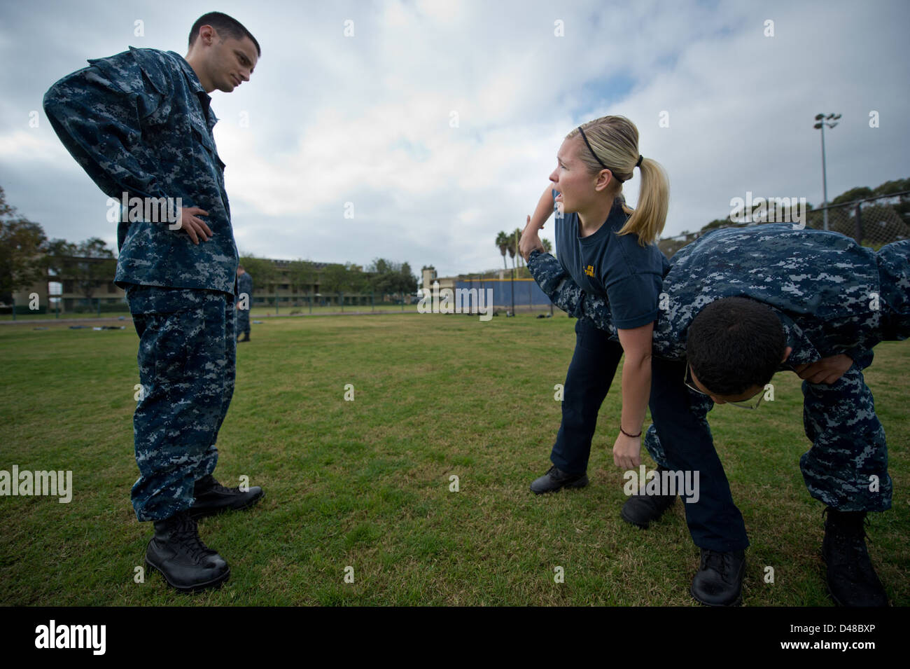 A police instructor demonstrates a takedown hold during training in San ...