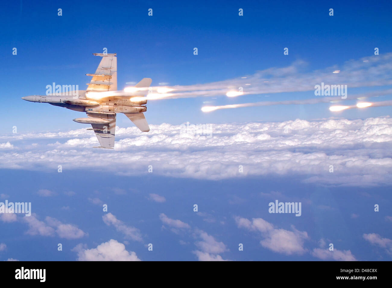 An F/A-18 lanches flares Stock Photo - Alamy