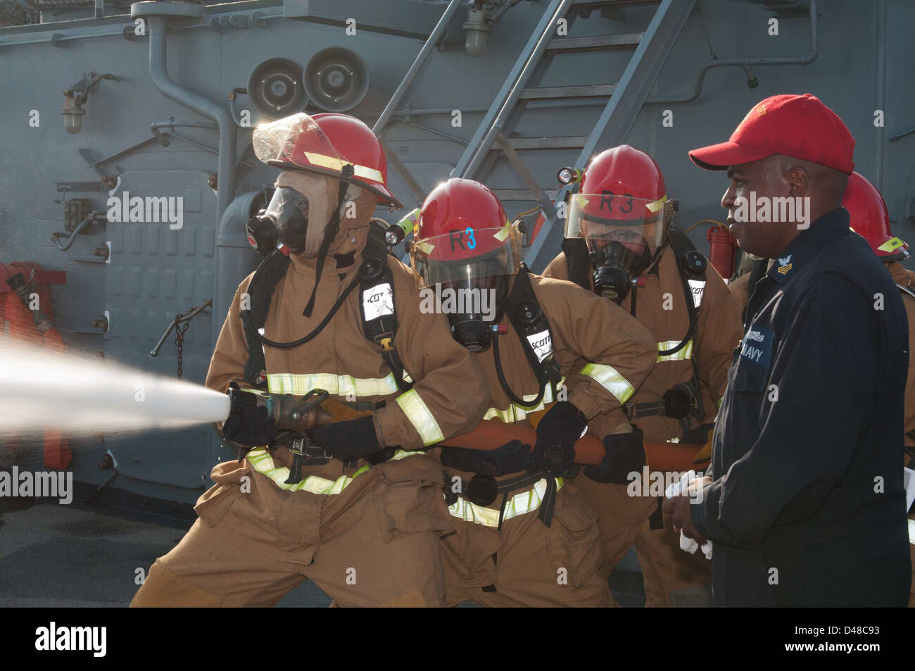 Sailors conduct firefighting training Stock Photo - Alamy