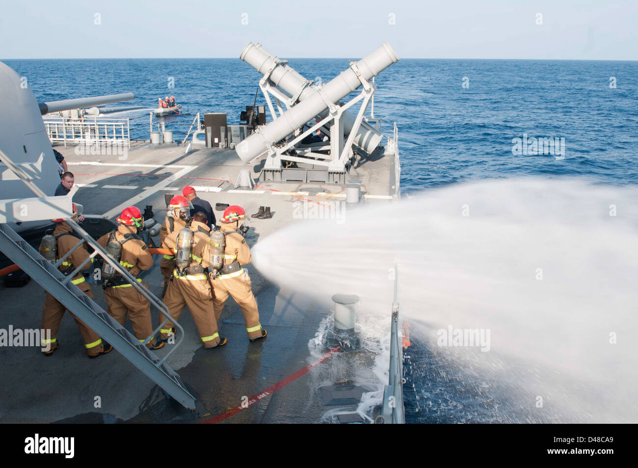 Sailors conduct firefighting training Stock Photo - Alamy