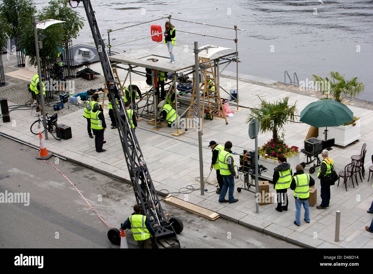 Film Crew in operation on a film or movie set Stock Photo - Alamy