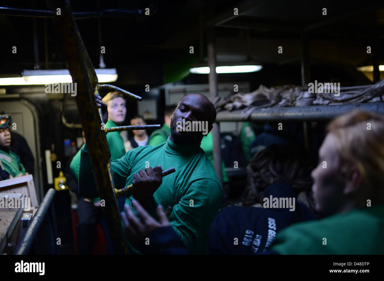 Sailors aboard U.S. Navy ships perform a training exercise at sea in ...