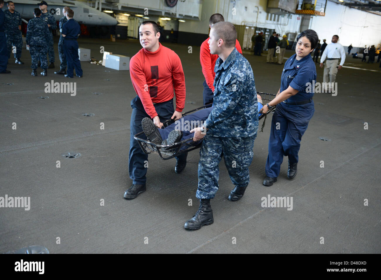 Sailors aboard the USS George H.W. Bush participate in a mass casualty ...