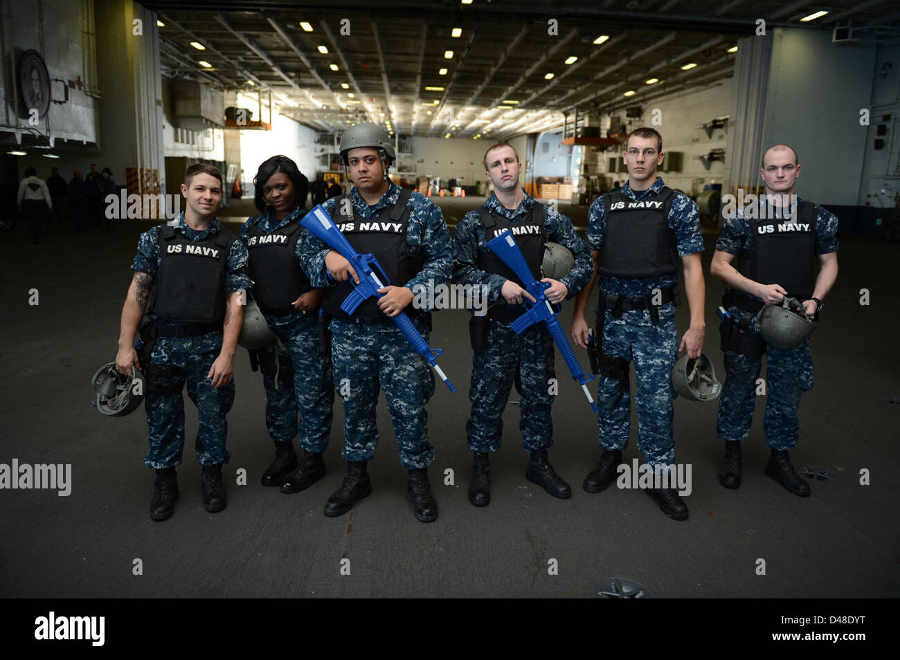 Members of the security reaction force aboard the USS George H.W. Bush ...