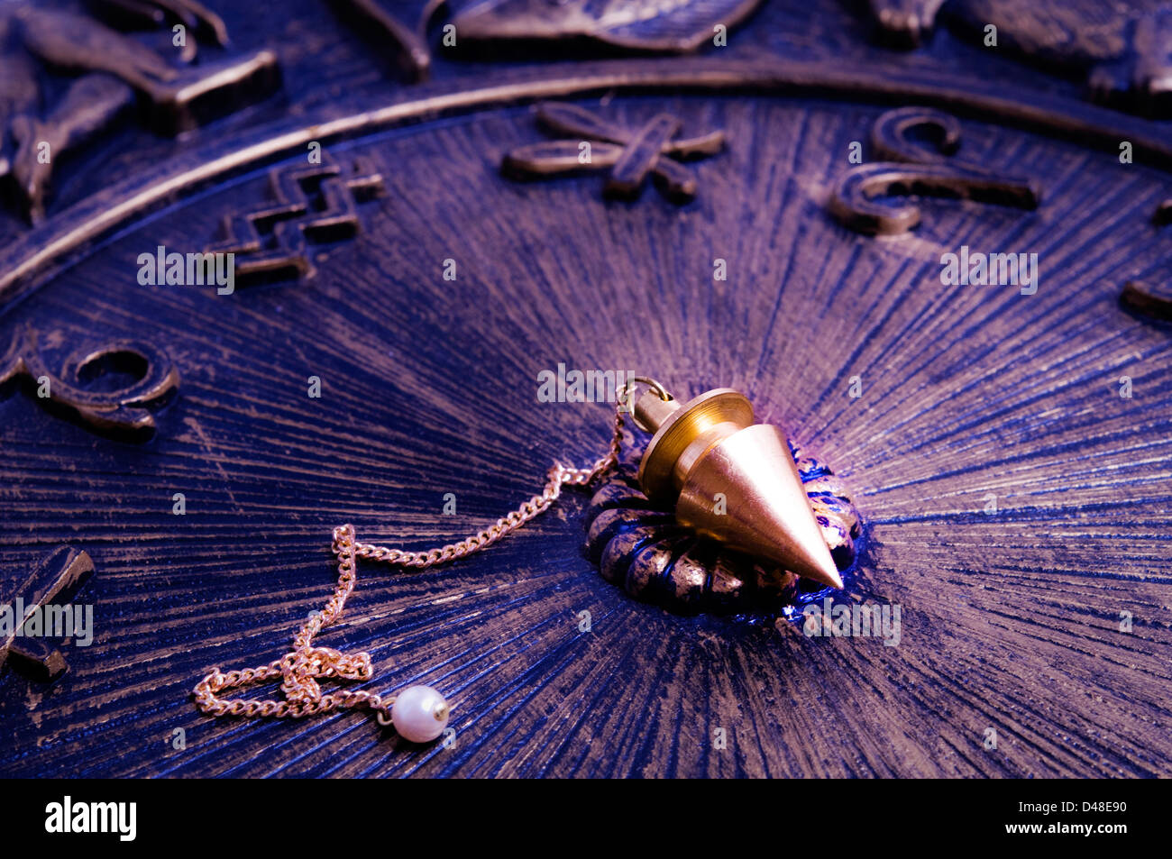 astrology and pendulum Stock Photo - Alamy