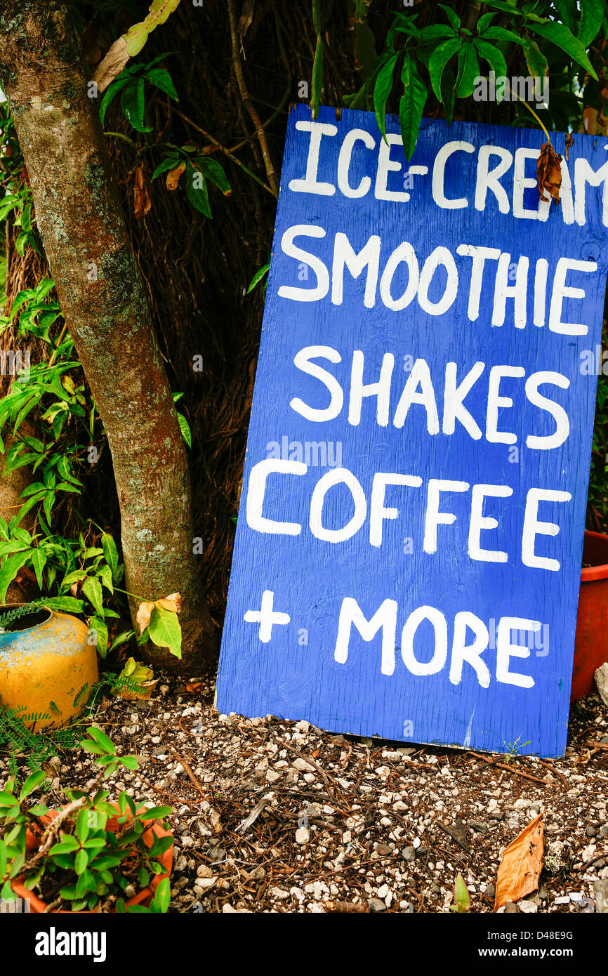 Food sign selling ice cream and drinks, hand painted, white on blue ...