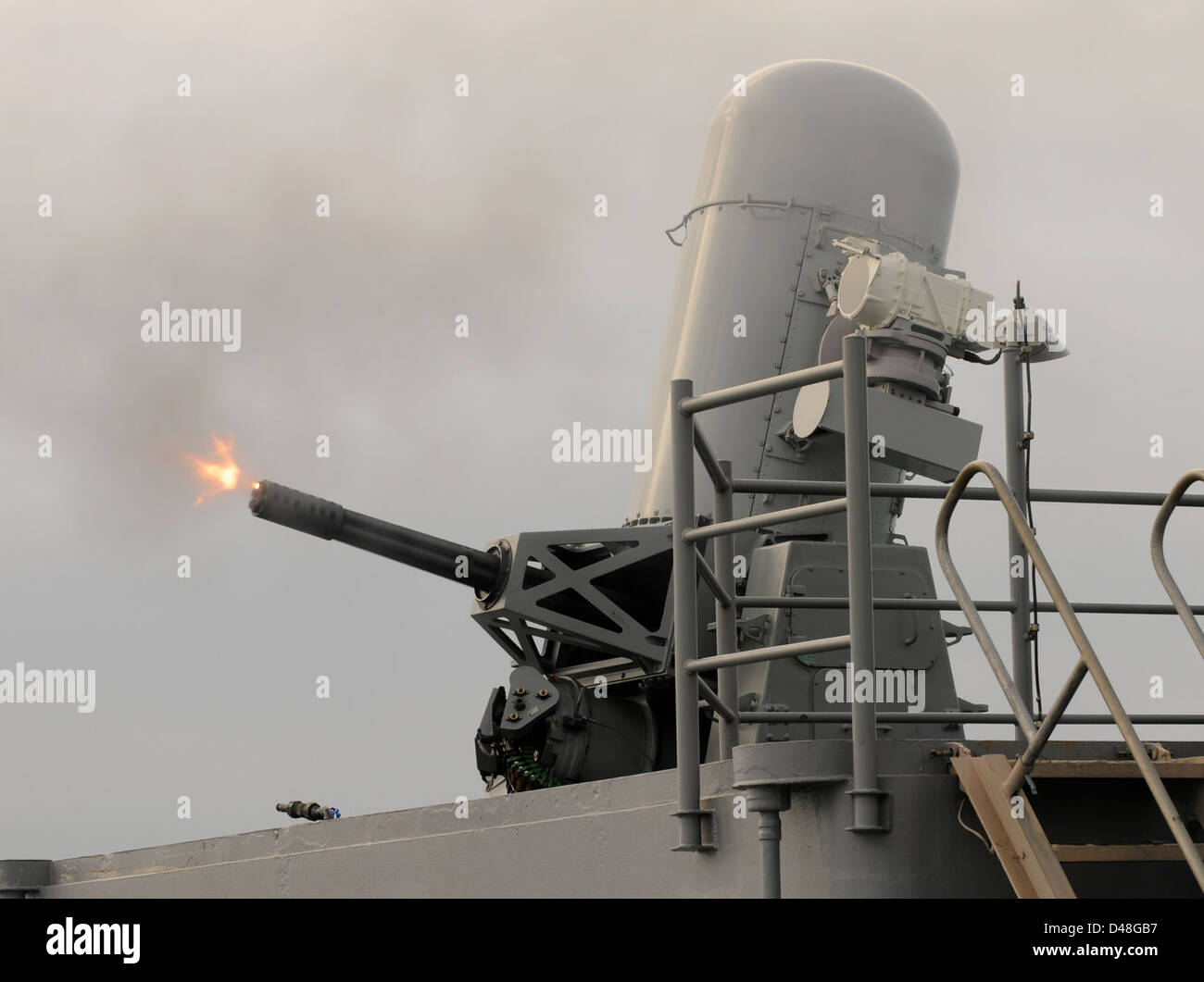 A Close-In Weapon System (CIWS) is test-fired aboard the USS Blue Ridge ...