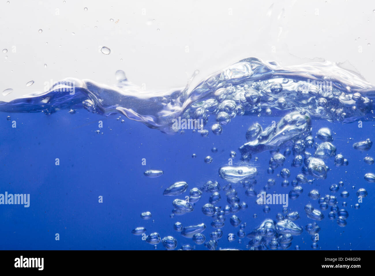 Close up on blue sparkling water Stock Photo - Alamy