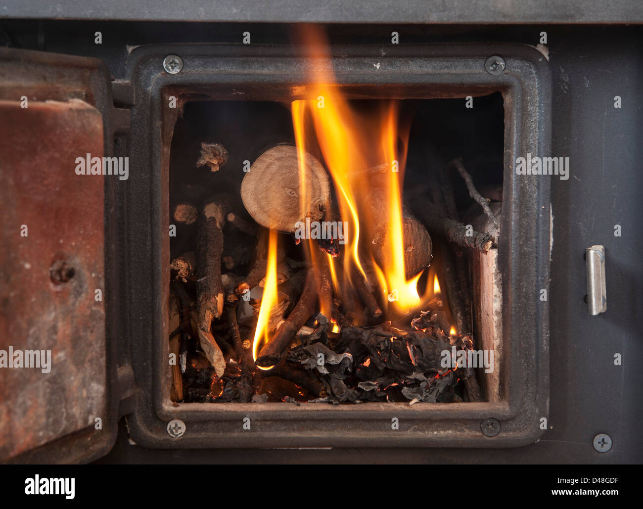 Woodstove, inside detail of fire-box Stock Photo - Alamy