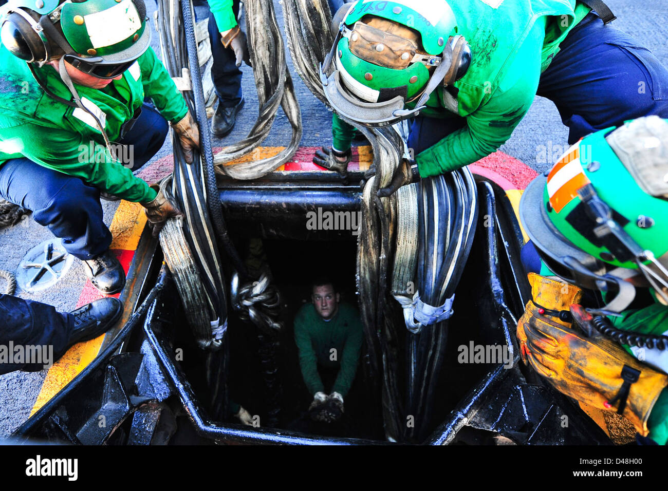 Sailors conduct flight deck barricade drills on a U.S. Navy aircraft ...