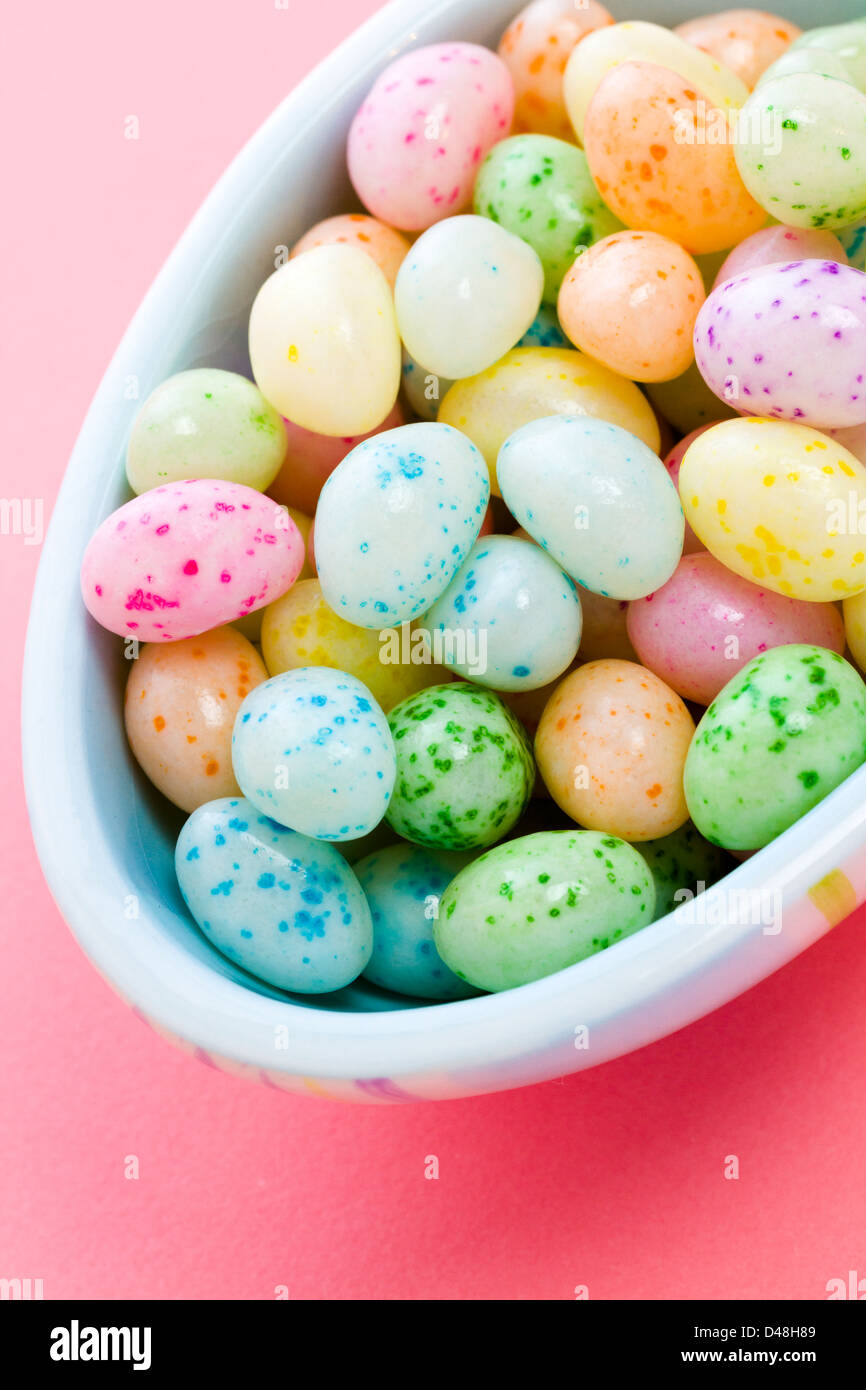 Assorted jelly beans in pastel colors with darker spots Stock Photo - Alamy