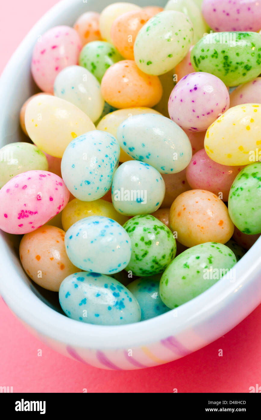 Assorted jelly beans in pastel colors with darker spots Stock Photo - Alamy