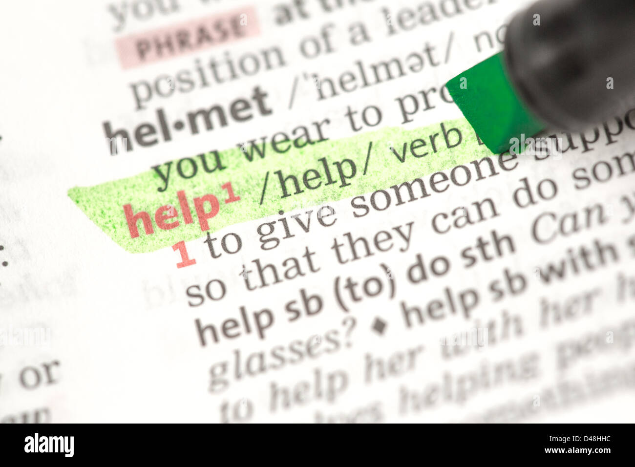 Help definition highlighted in green Stock Photo - Alamy